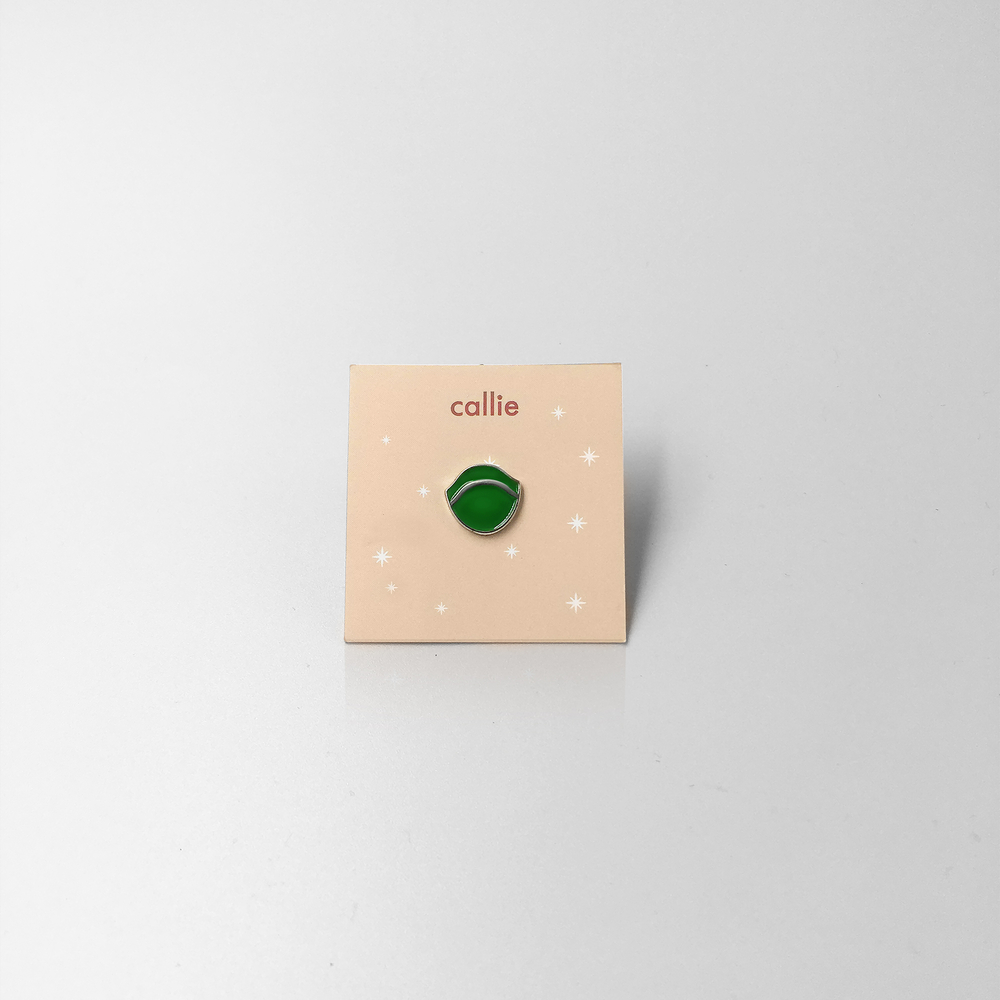 Callie Mask festive Christmas enamel pin - logo in green for face mask ...